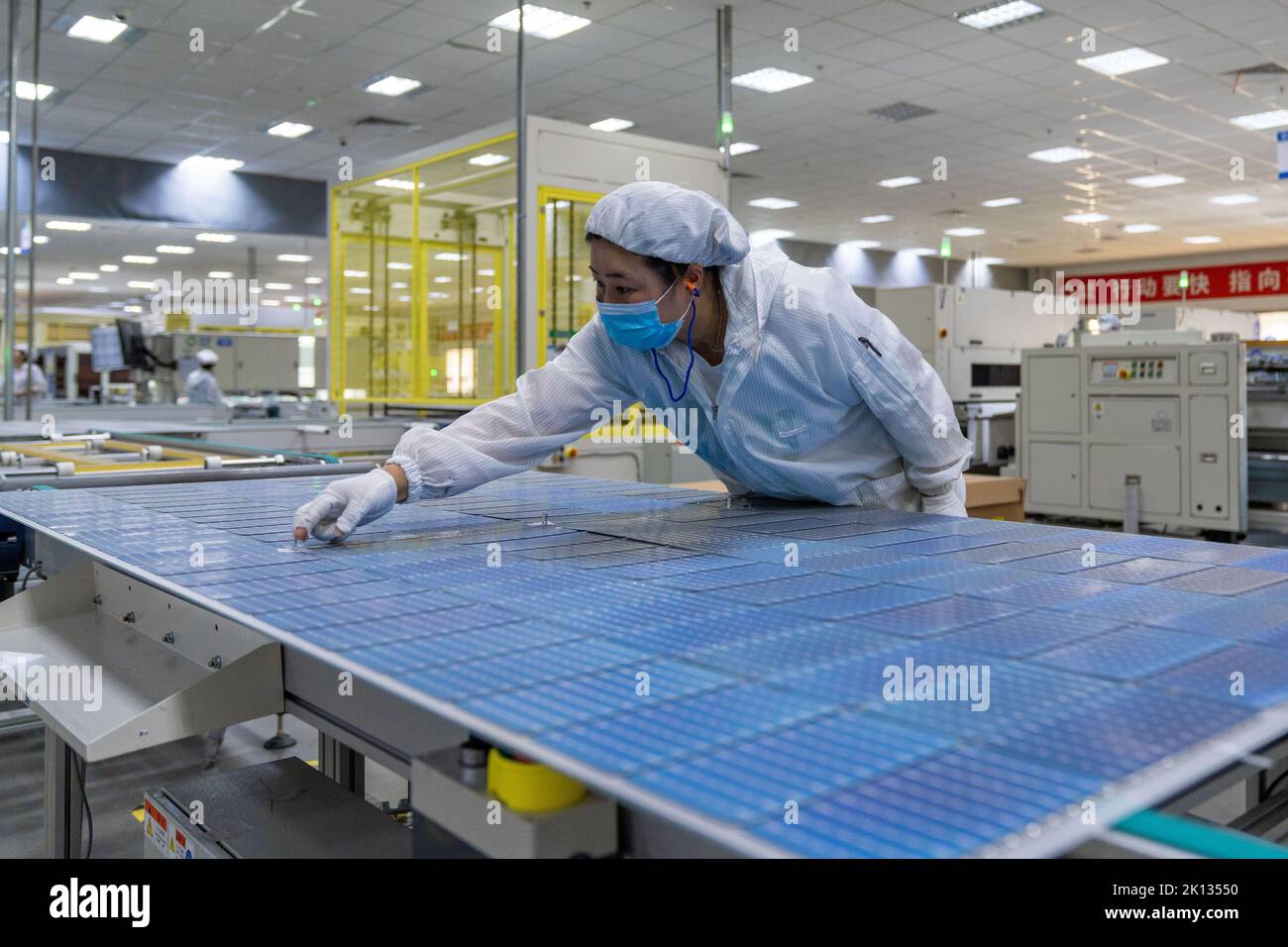 HEFEI, CHINA - SEPTEMBER 15, 2022 - A worker produces solar ...