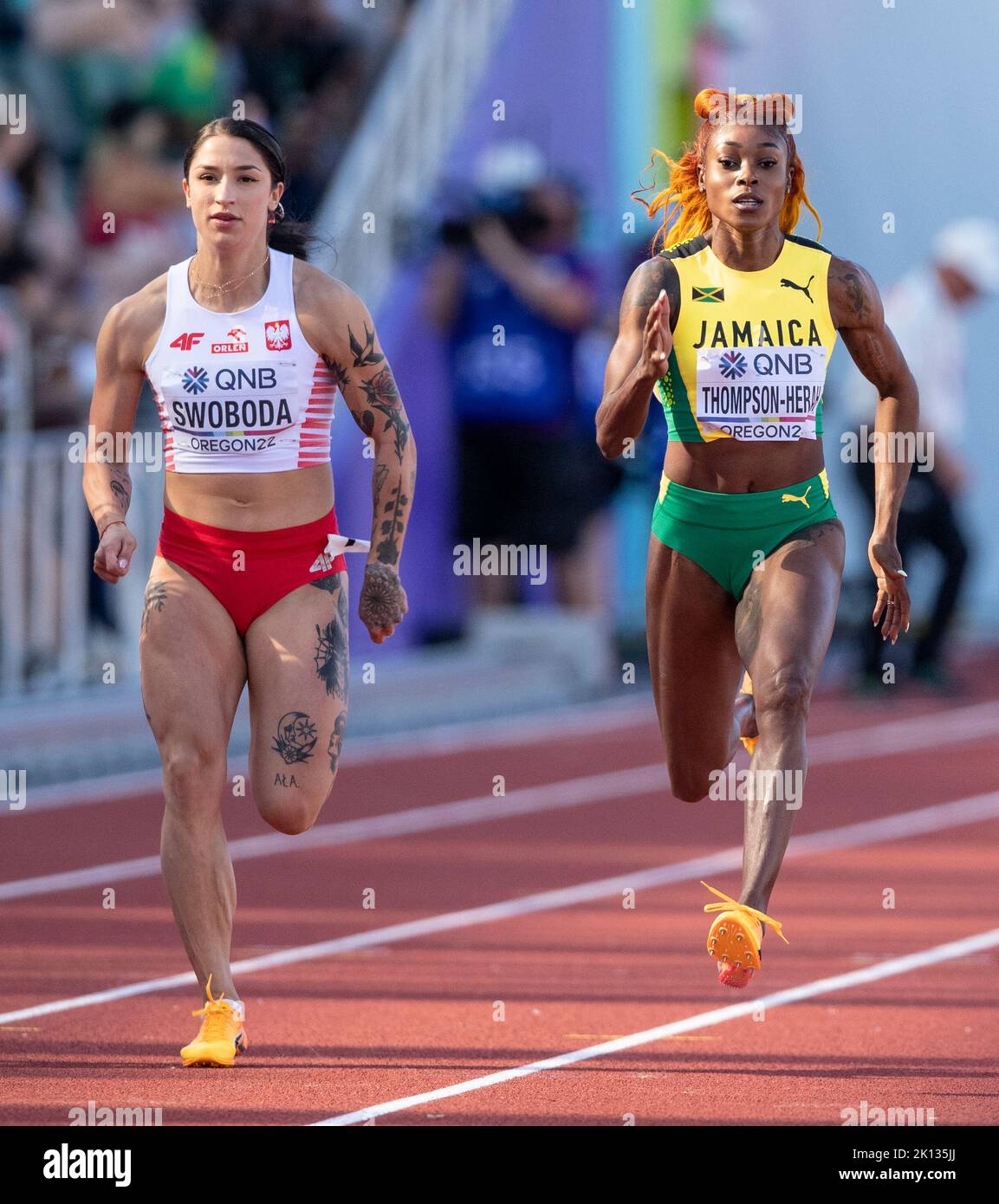 Ewa Swoboda of Poland and Elaine Thompson-Herah of Jamaica competing in ...