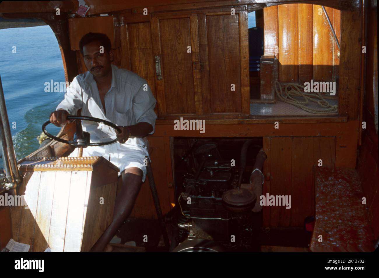 Boat Driver in Back Waters, Kerala Stock Photo - Alamy