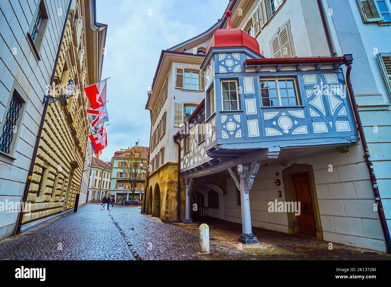 Medieval street with old painted balcony in Altstadt of Lucerne ...