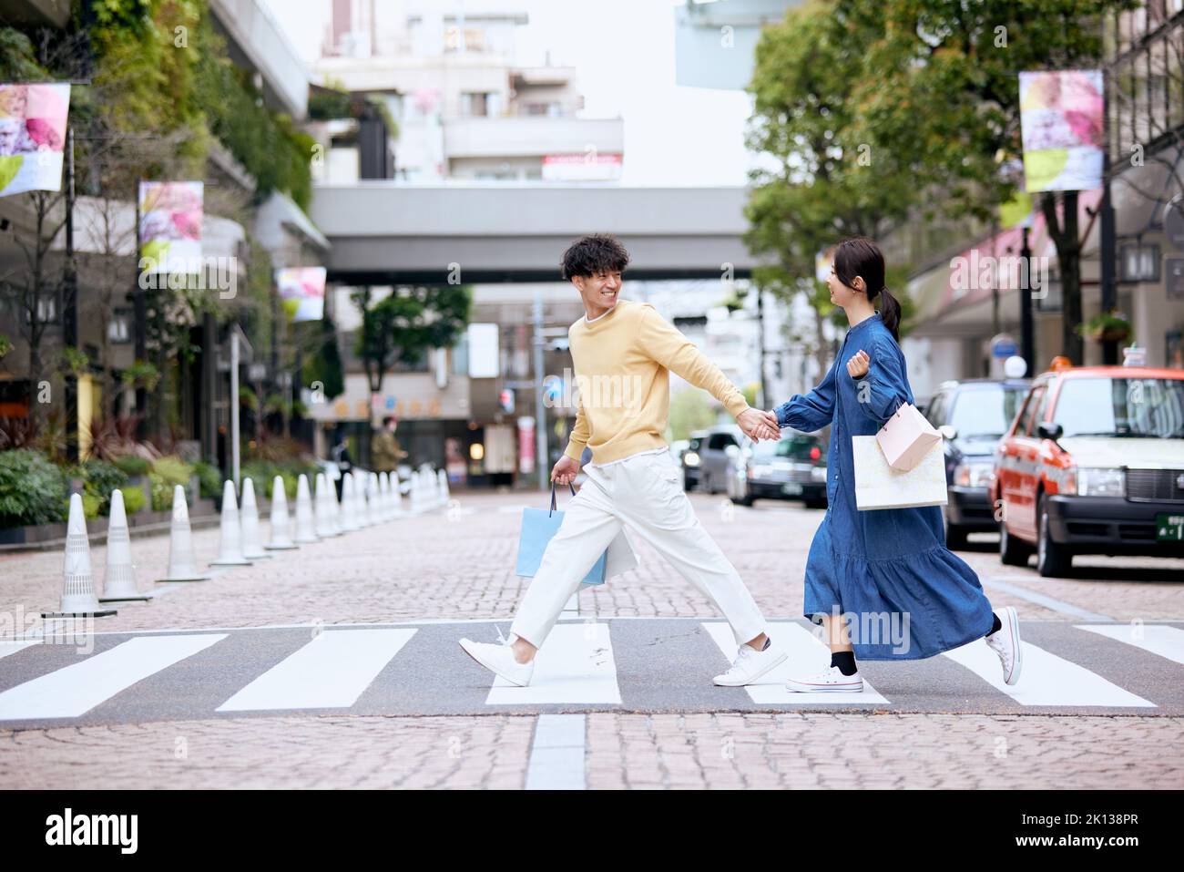 Japanese couple dating in Tokyo Stock Photo - Alamy