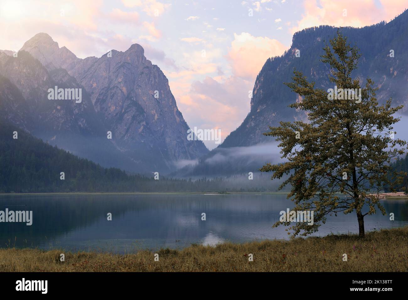 Lake Dobbiaco at sunrise in summer, Sud Tirol, Italy, Europe Stock ...