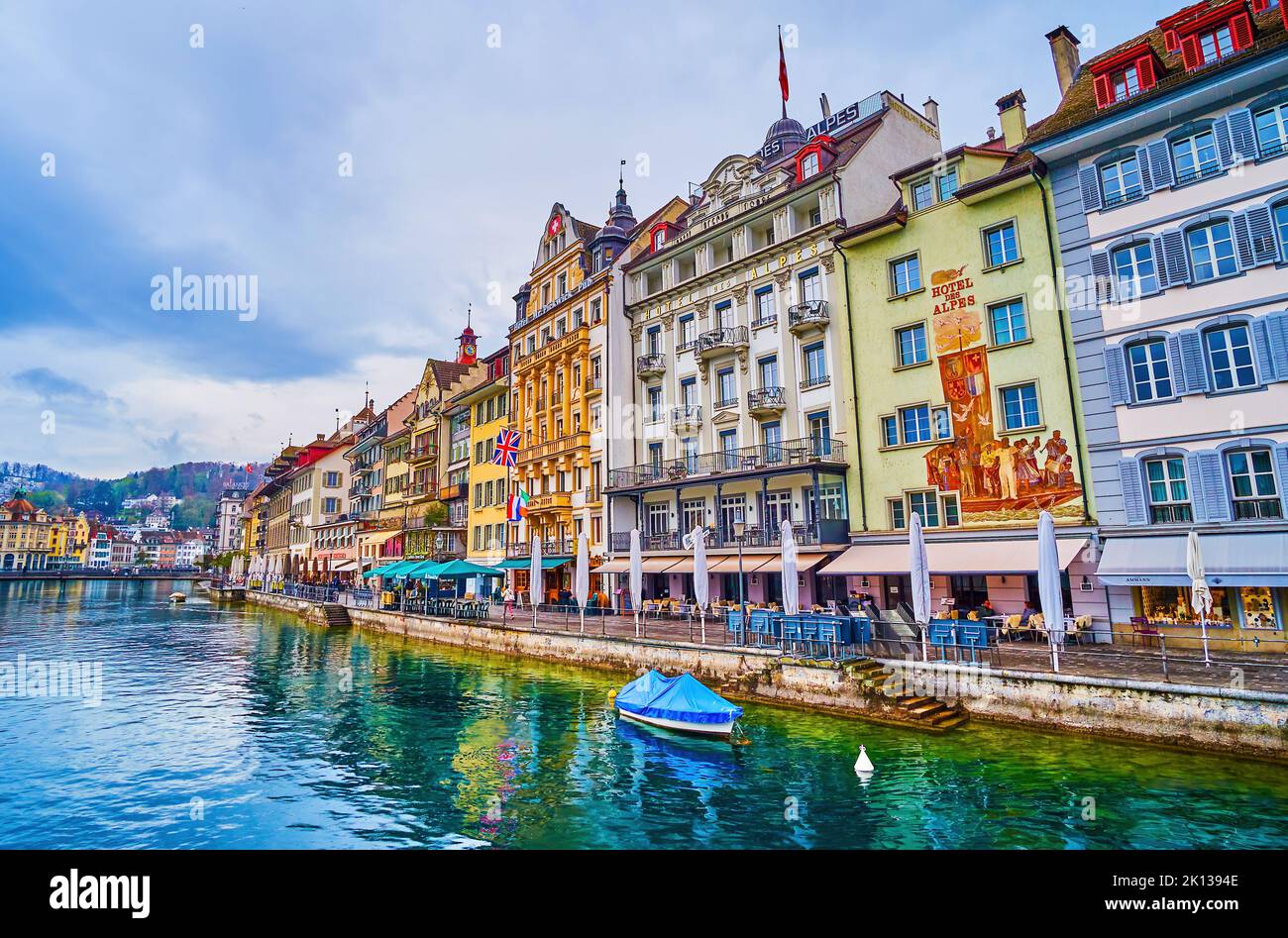 LUCERNE, SWITZERLAND - MARCH 30, 2022: Rathausquai embankment and ...