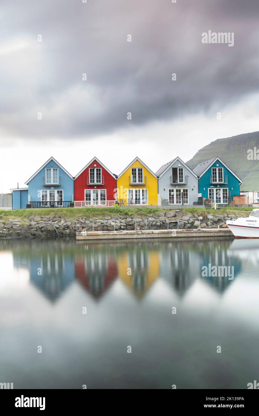 Traditional and colourful cabins on the oceanfront of Leirvik and ...