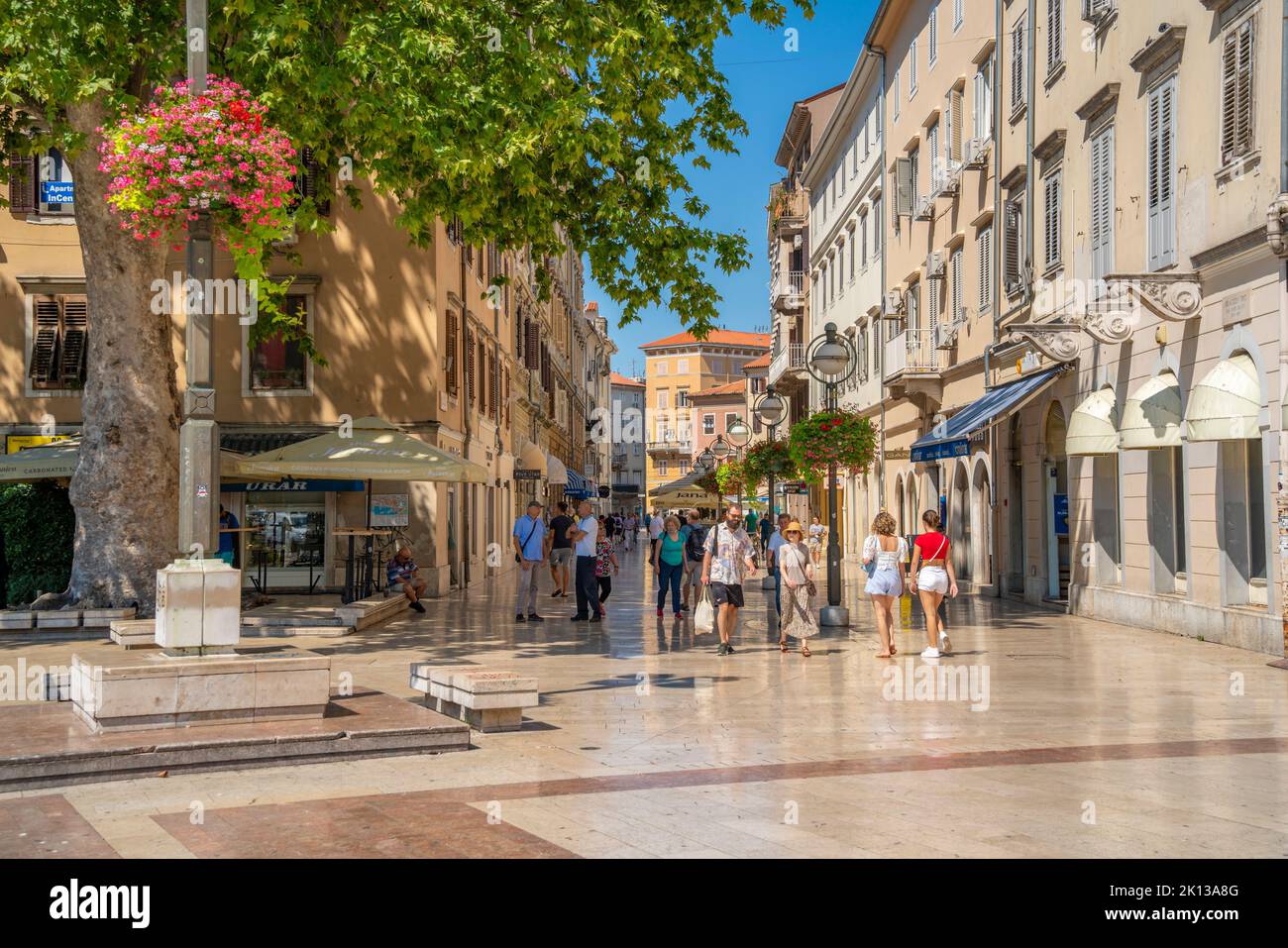 View of shops, people and ornate architecture on the Korzo, Rijeka ...