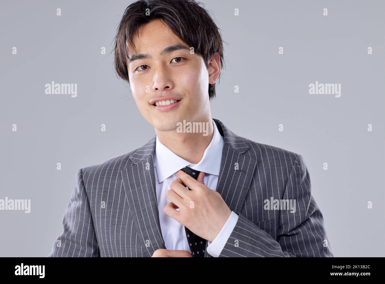 Japanese businessman studio portrait Stock Photo - Alamy