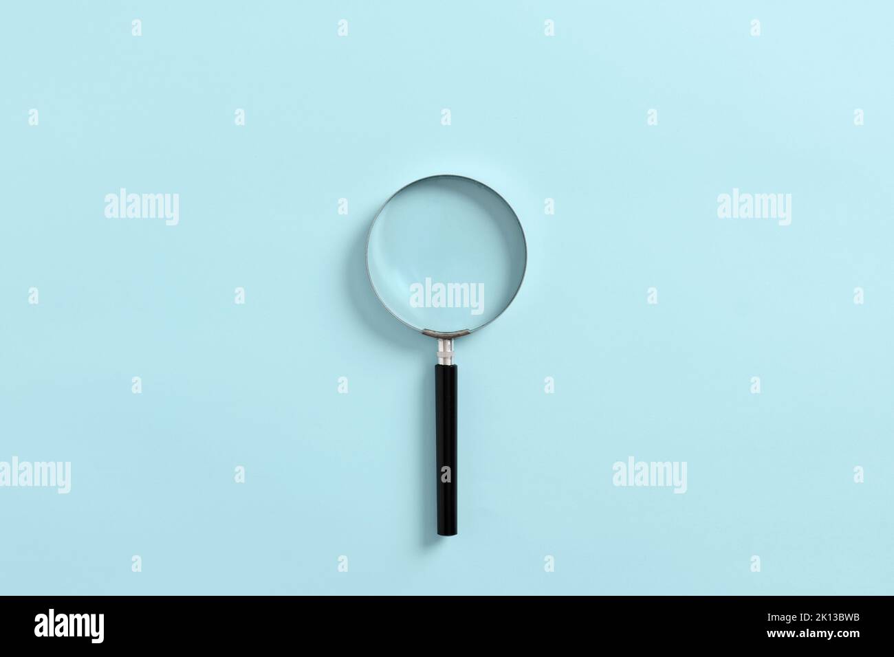 Blue magnifying glass search people hi-res stock photography and images ...