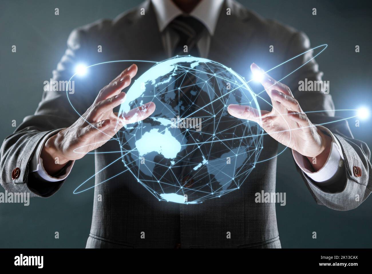 Japanese businessman with CGI world map Stock Photo - Alamy