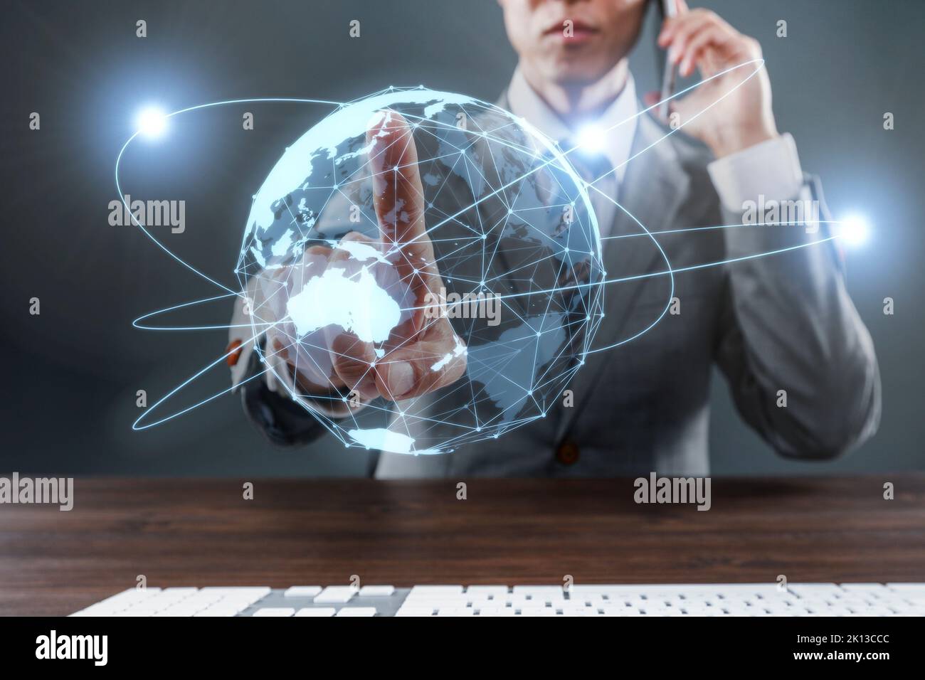 Japanese businessman with CGI world map Stock Photo - Alamy