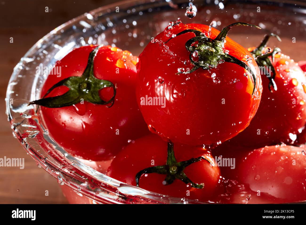 Tomatoes water in glass bowl hi-res stock photography and images - Alamy