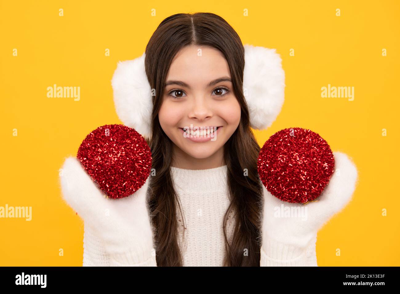 Merry christmas and happy New year. Kid in winter clothes. Teen girl ...