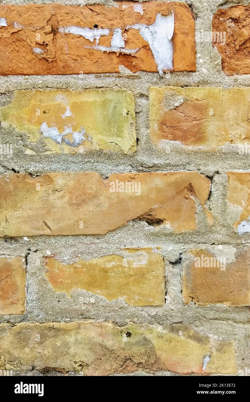 A vertical closeup shot of an old brick wall background Stock Photo - Alamy
