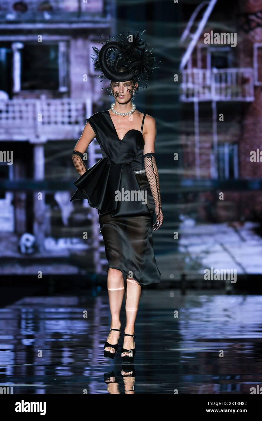 Madrid, Spain. 15th Sep, 2022. A model walks the runway wearing a ...