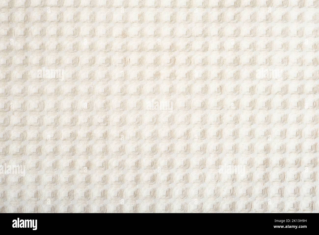 close up view of textured cotton fabric. unbleached linen textile ...