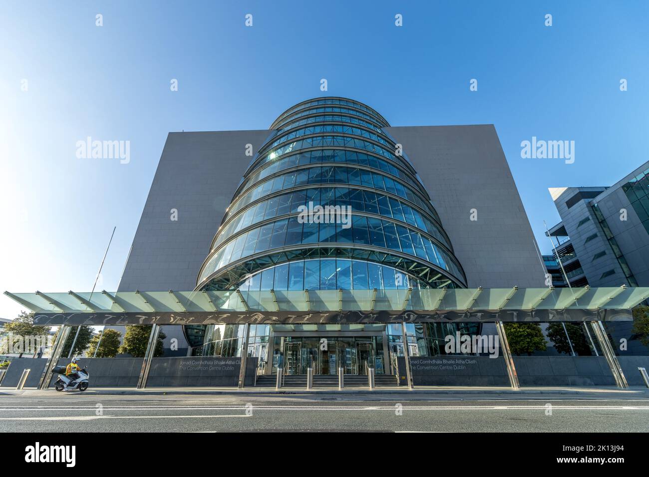 The front view of the round glass building of the Convention Center in ...