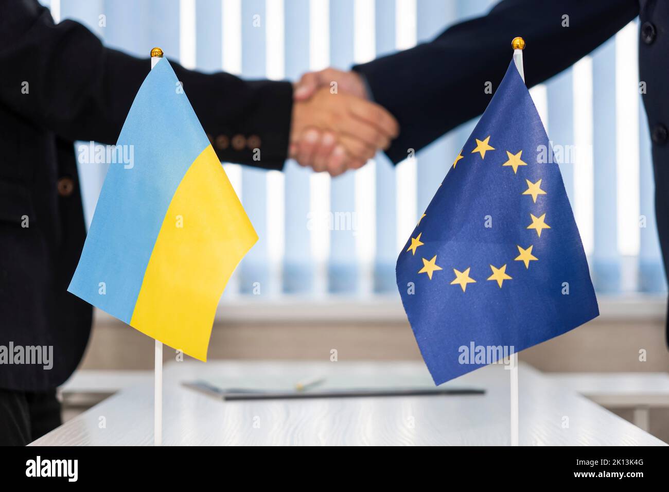 Political flags of Ukraine and European Union.. concept of negotiations ...