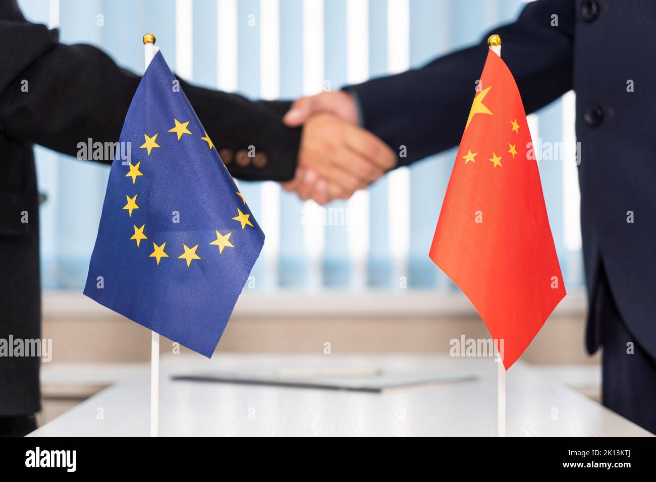 Political flags of European Union and china on table. concept of ...