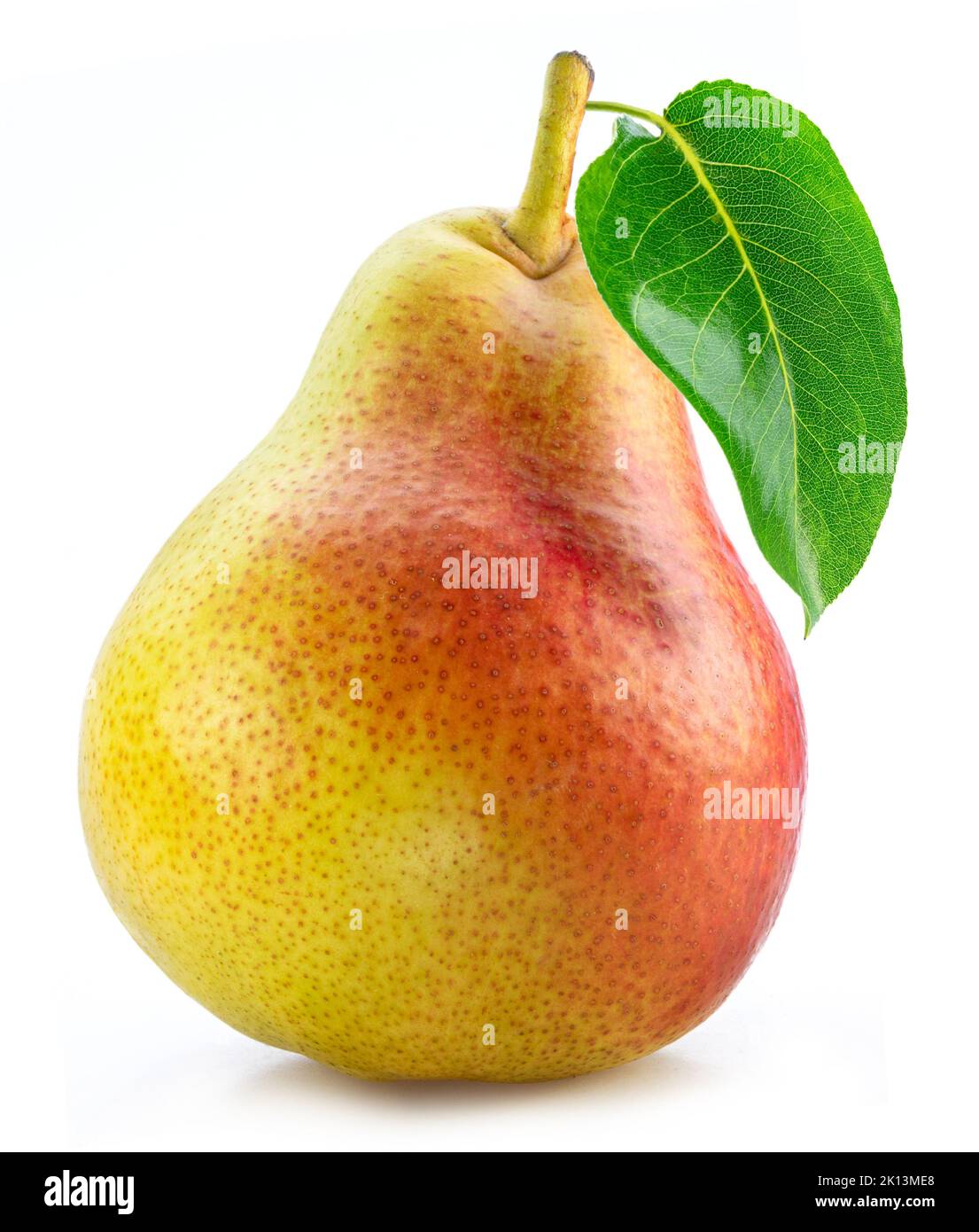 Ripe pear with green leaf isolated on white background Stock Photo - Alamy