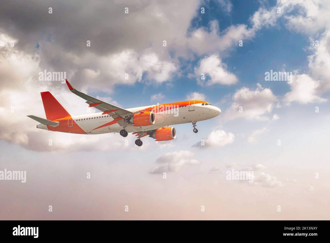 Side view of airplane in the sky Stock Photo - Alamy