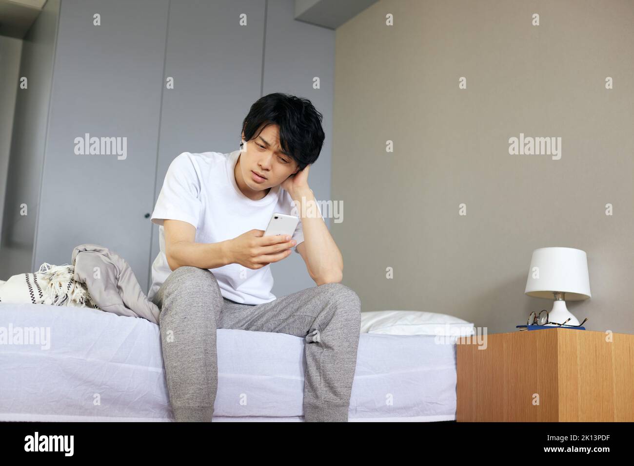 Japanese man waking up Stock Photo - Alamy