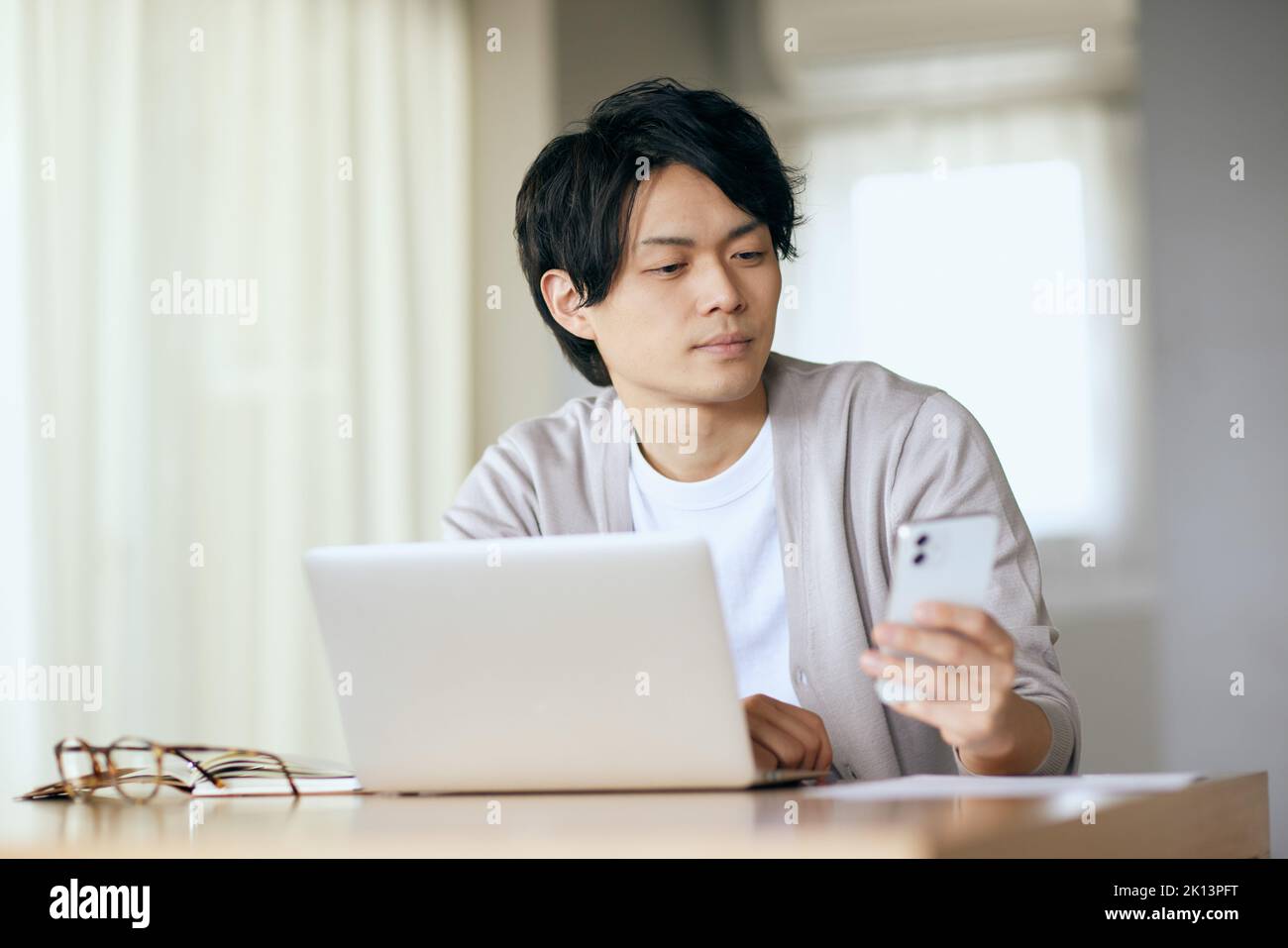 Japanese man working from home Stock Photo - Alamy