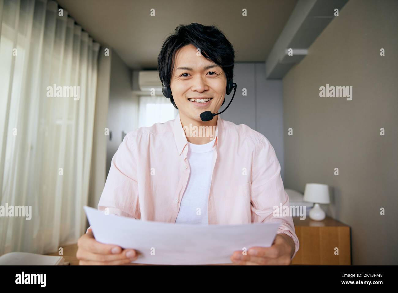 Japanese man working from home Stock Photo - Alamy