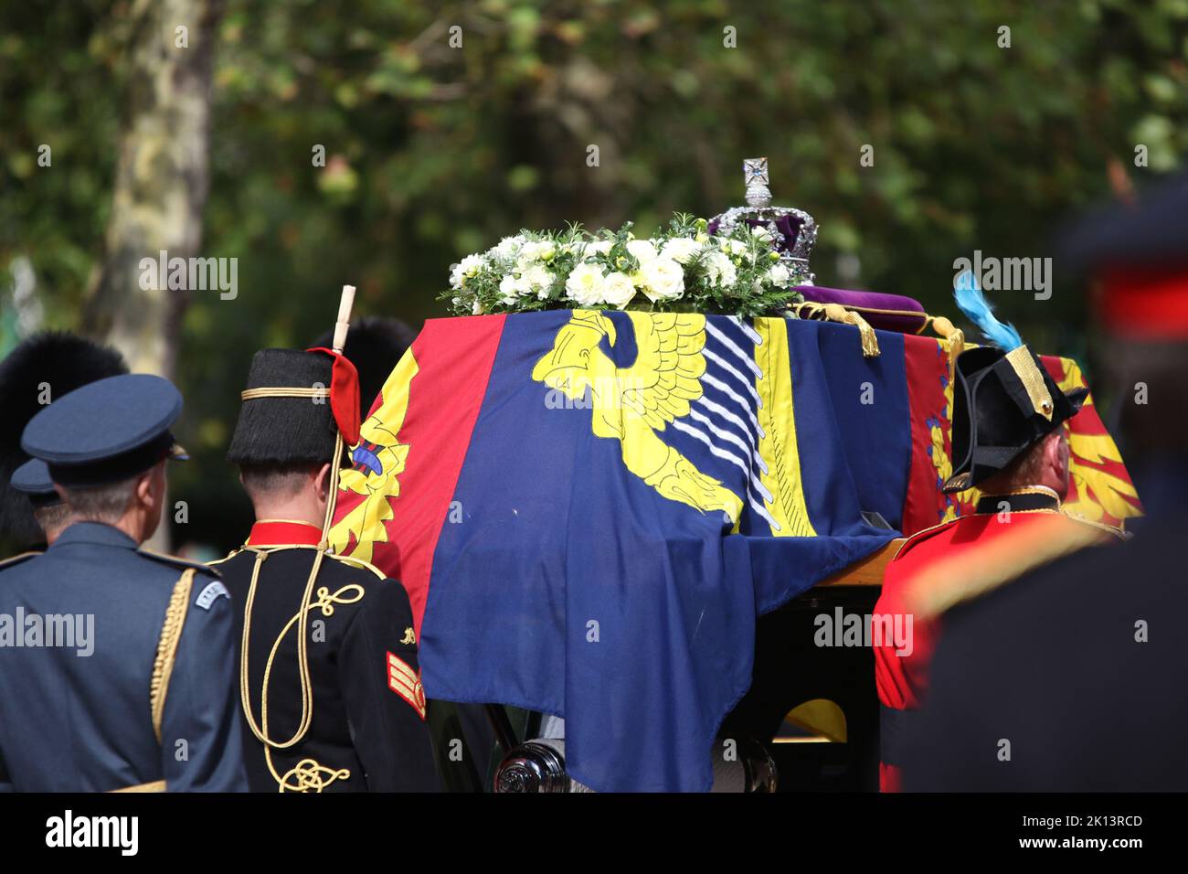 Queen Elizabeth the second is carried on a gun carriage from Buckingham ...