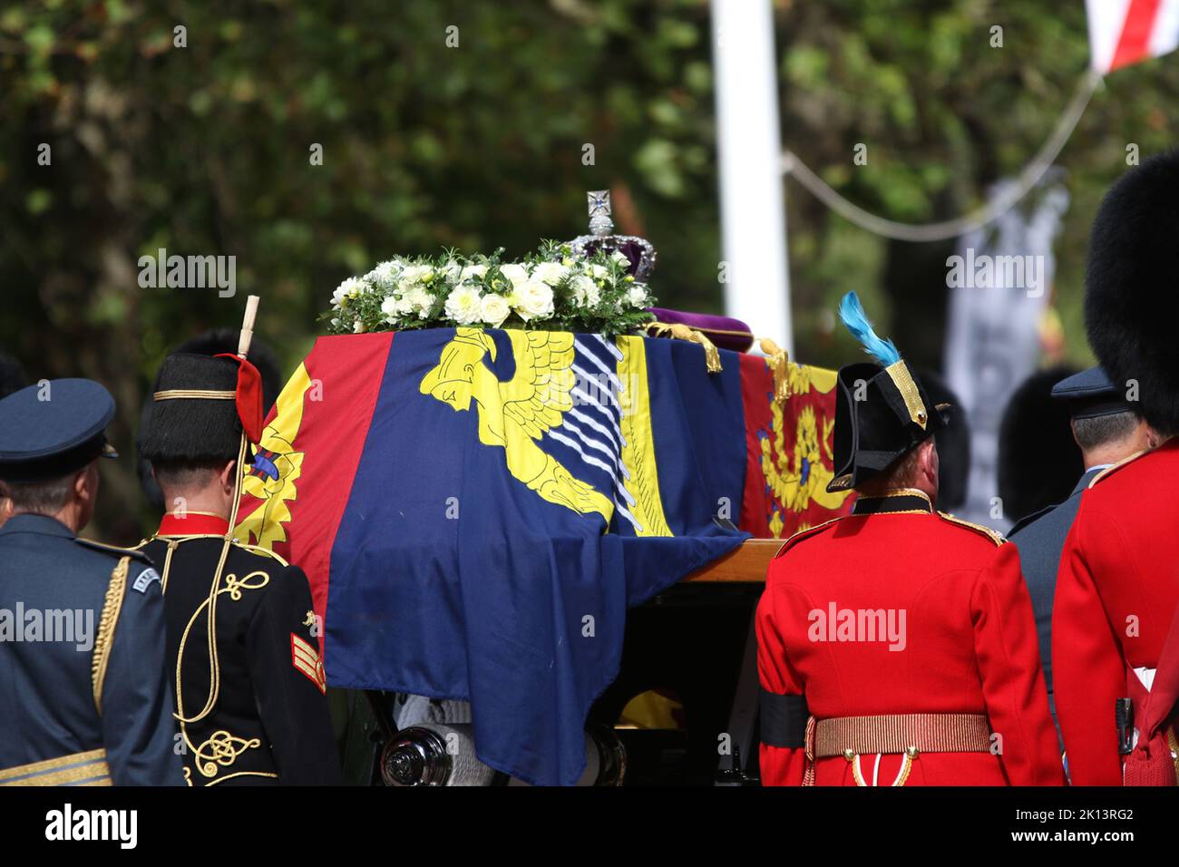 Queen Elizabeth the second is carried on a gun carriage from Buckingham ...