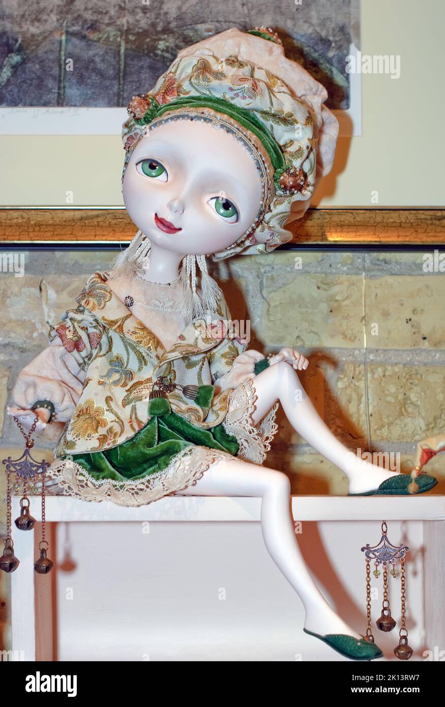 A collectible doll, a girl with pendants, is on display at the Angel ...