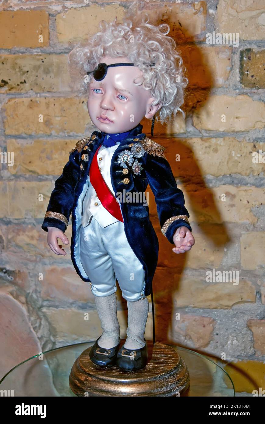 A collectible doll, a general with false eye-band, is on display at the ...