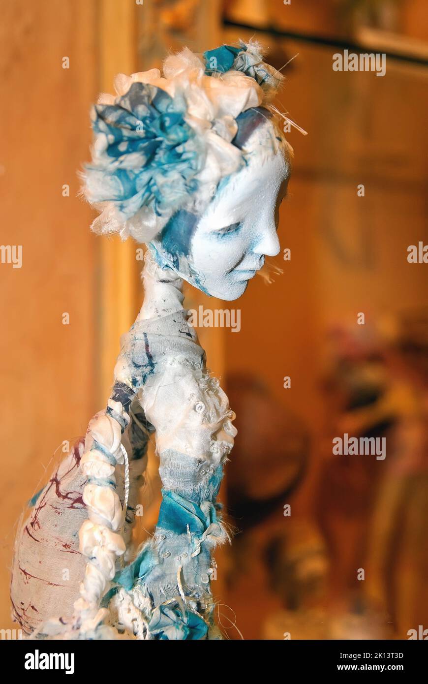 A collectible doll, a young woman detailed, is on display at the Angel ...