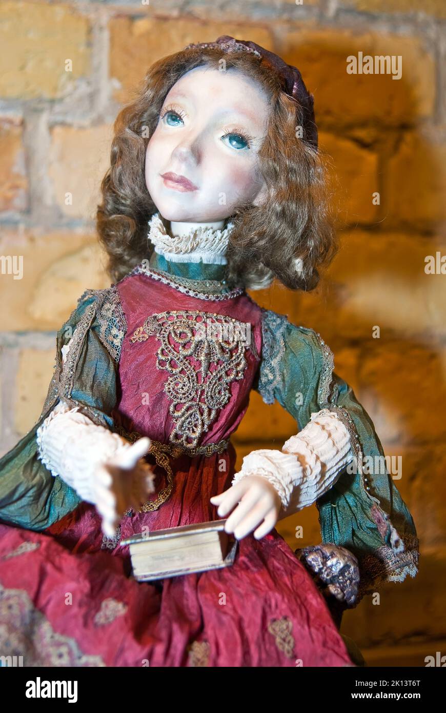 A collectible doll, a young minstrel pageboy detailed, is on display at ...