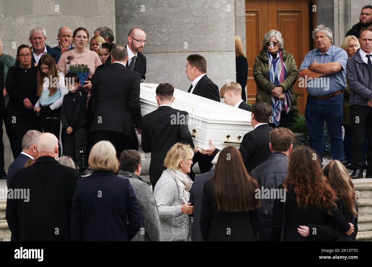 The coffin bearing the remains of Mikey (2) and Thelma Dennany (5) is ...