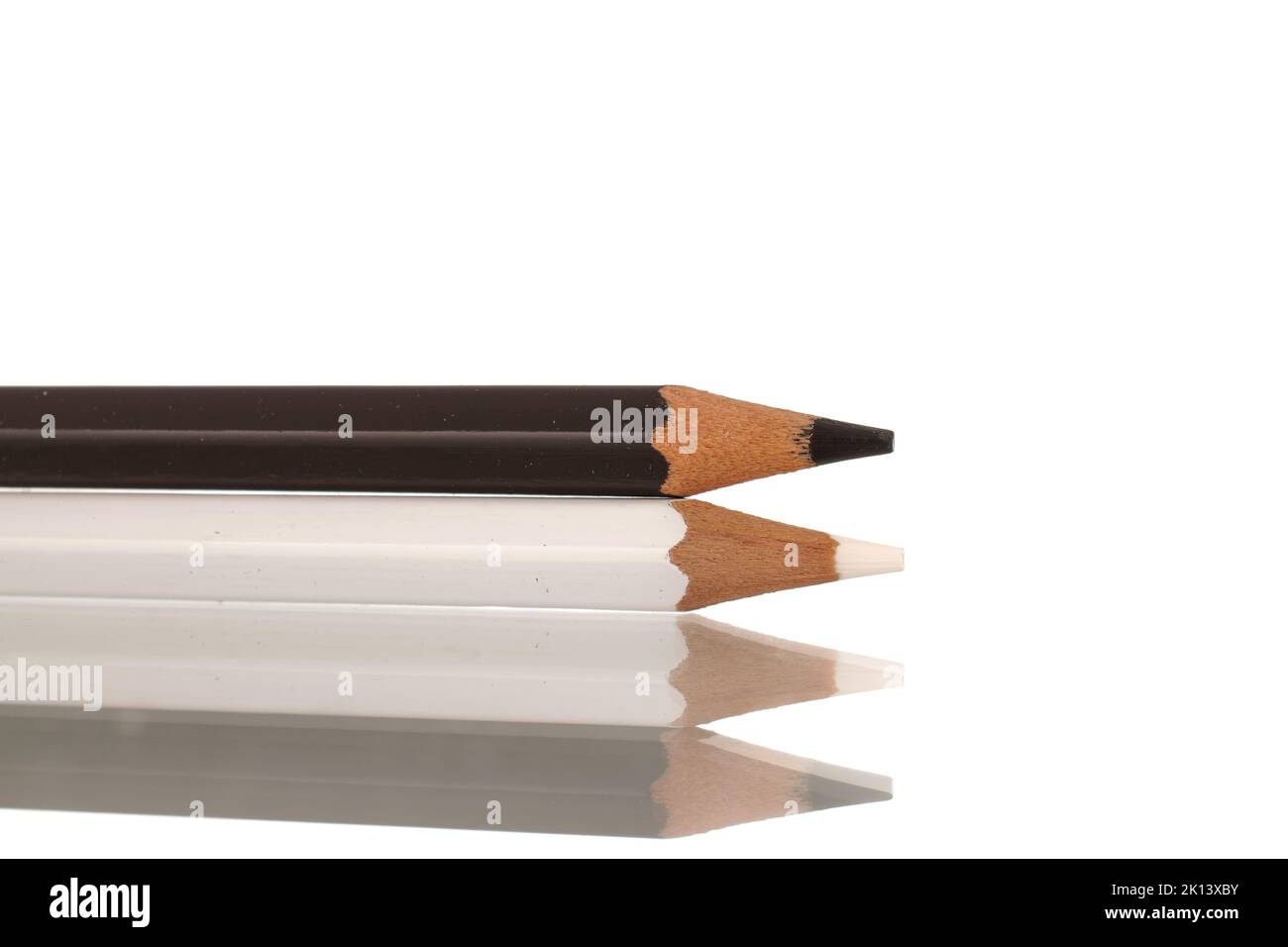 Two pencils with white and black lead, close-up, isolated on white ...