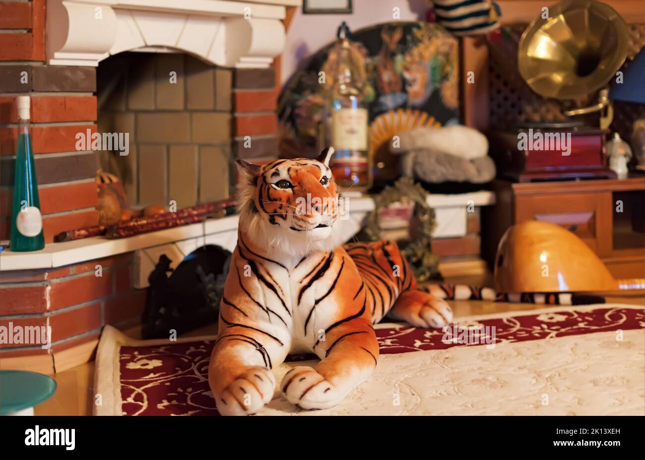 Fluffy tiger of a cozy interior Stock Photo - Alamy