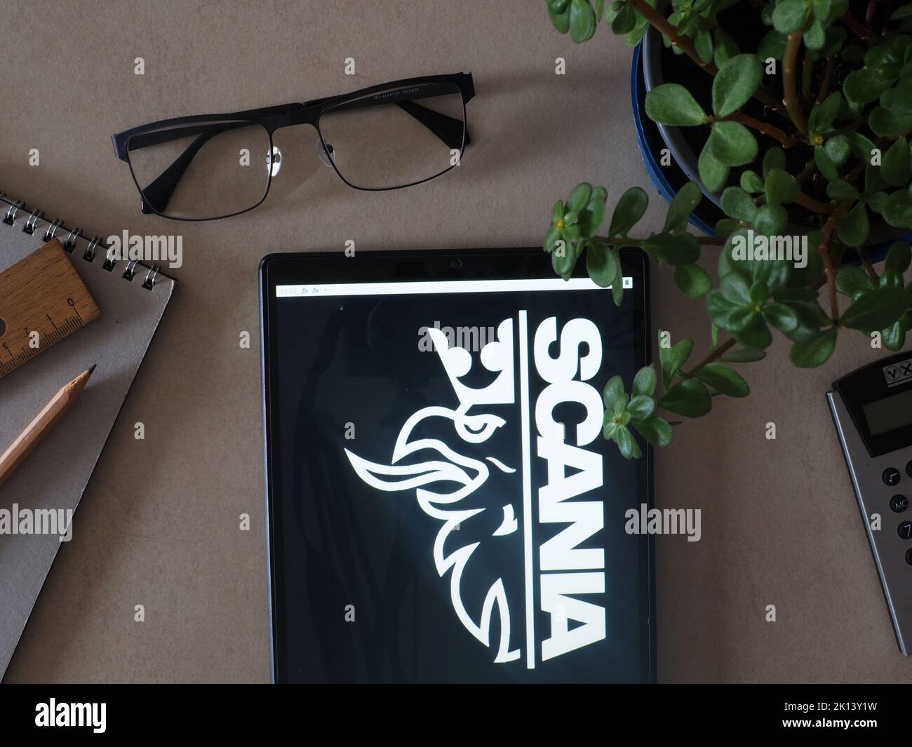 In this photo illustration, Scania brand of Traton Group logo seen ...