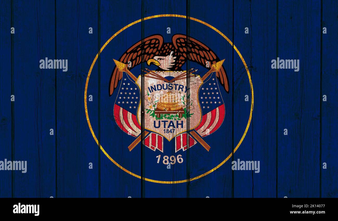 Top view of Old Painted Flag of Utah state, USA on Dark Wooden Fence ...