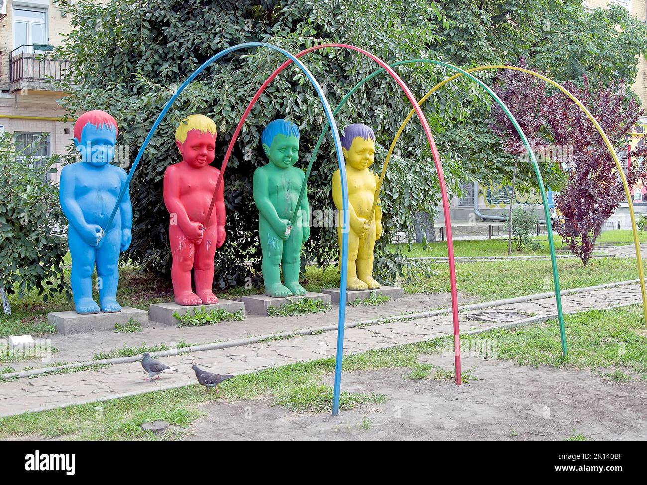 The Boys Pis funny sculpture group at Pejzazhna alley in Kiev, Ukraine ...