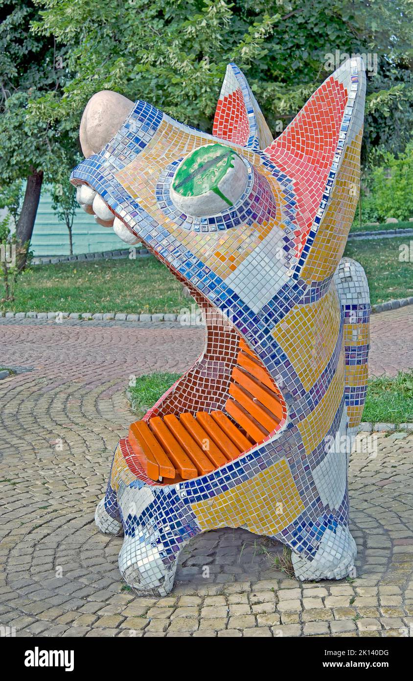 Sculptured bench of funny cat with opened mouth by the sculptor ...