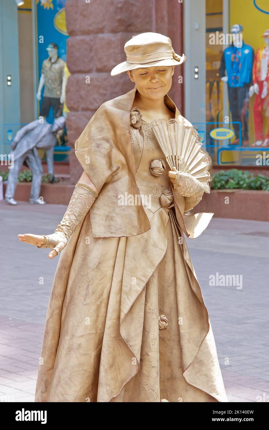 An unidentified busking mime performs on Khreshchatyk street in Kiev ...