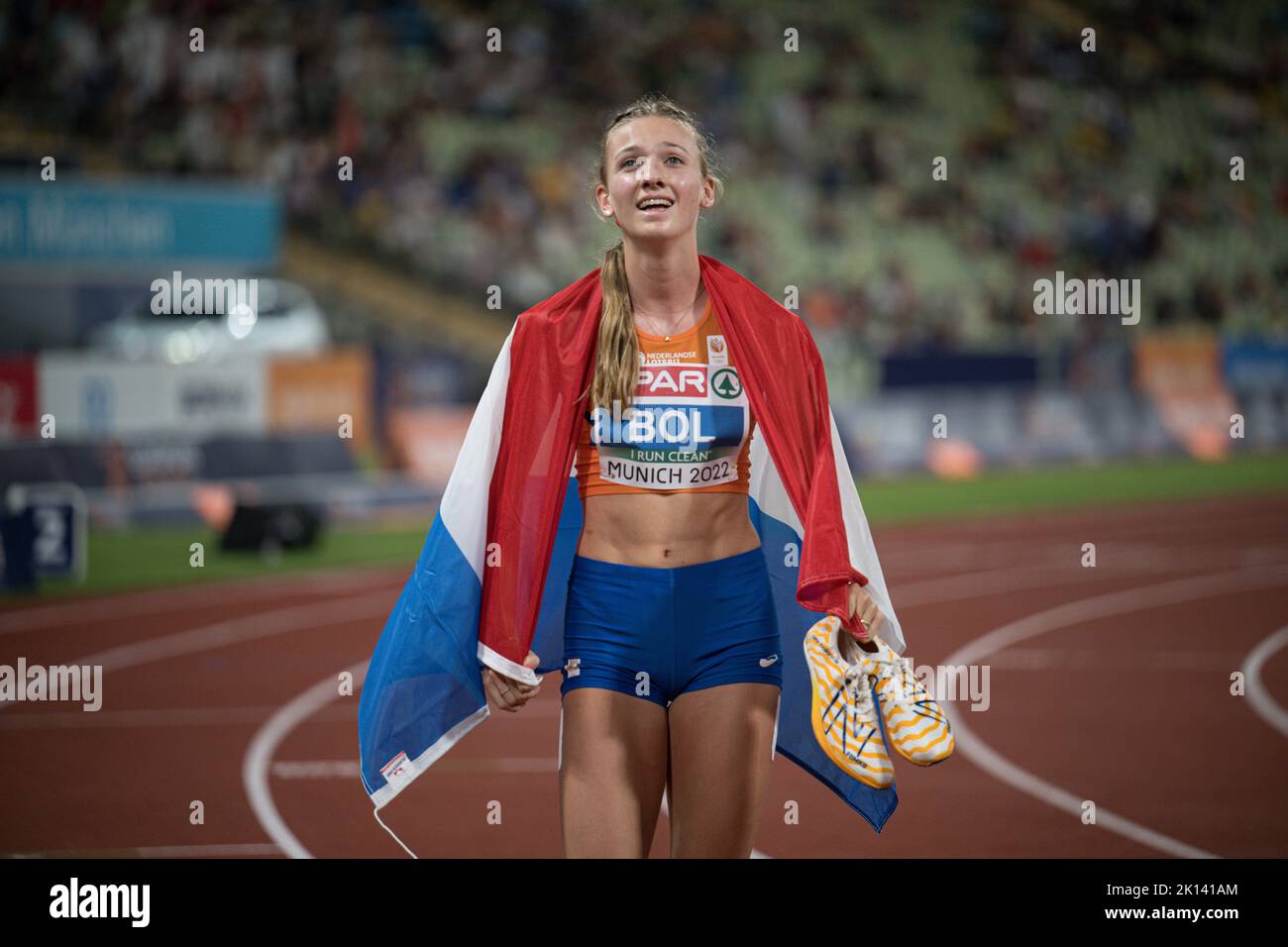Femke Bol with her country's flag as the winner of the 400 meters at ...