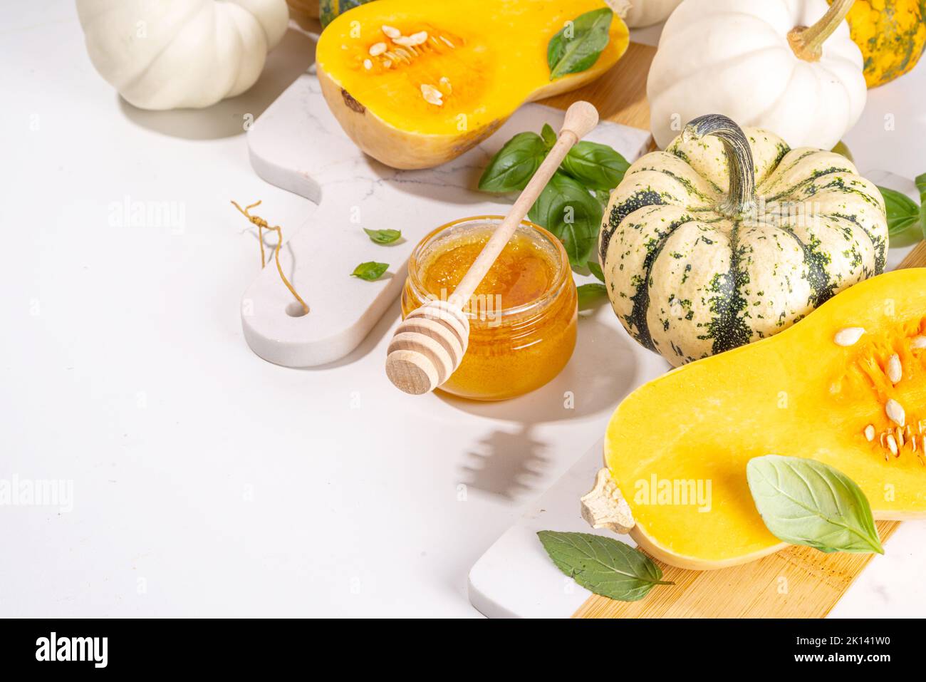 Pumpkins cooking background with various sizes, types and colors ...