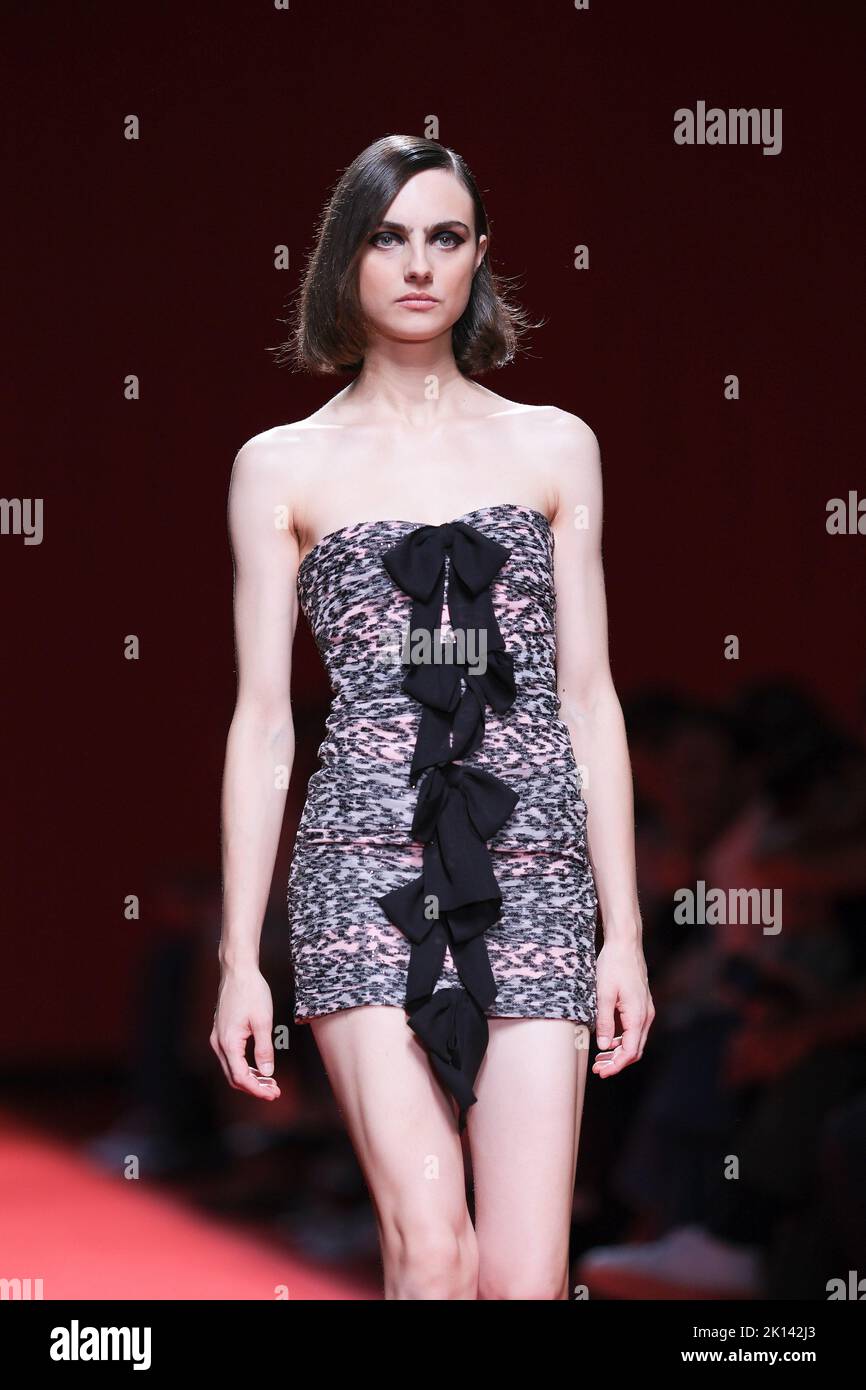 Madrid, Spain. 15th Sep, 2022. A model walks the runway wearing a ...