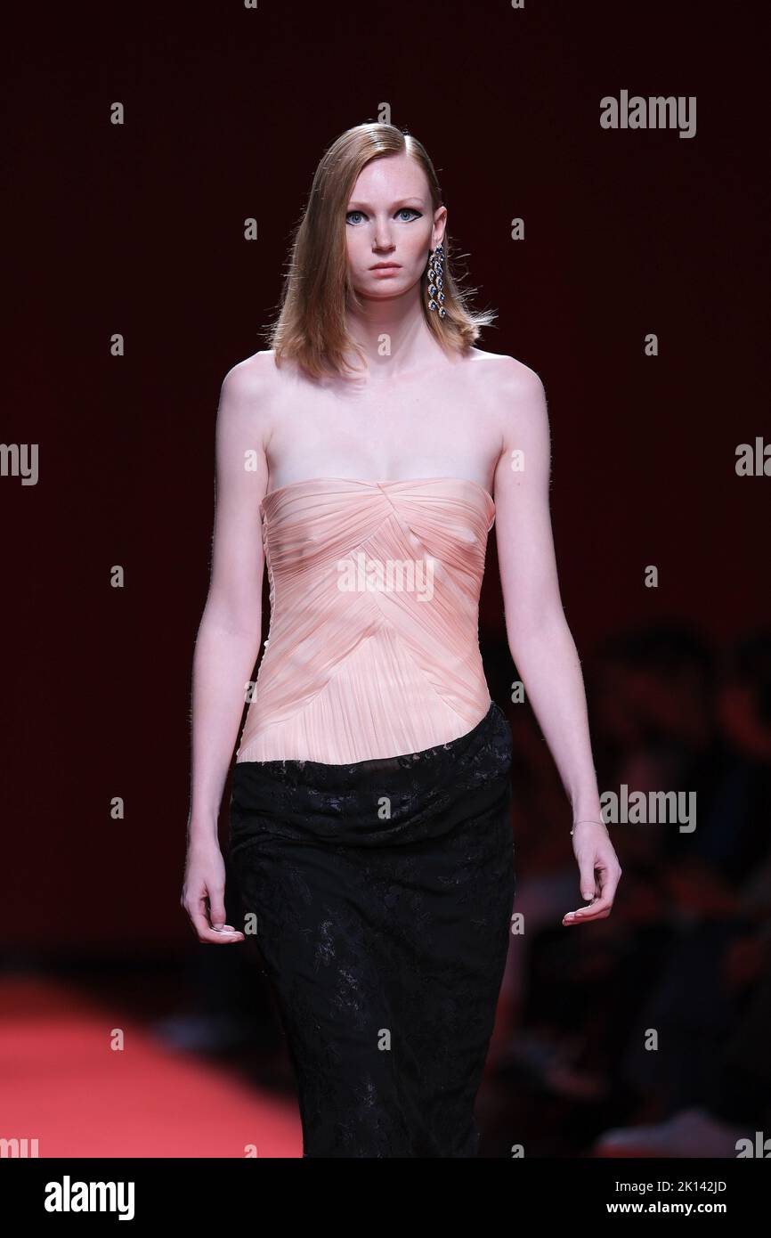 Madrid, Spain. 15th Sep, 2022. A model walks the runway wearing a ...