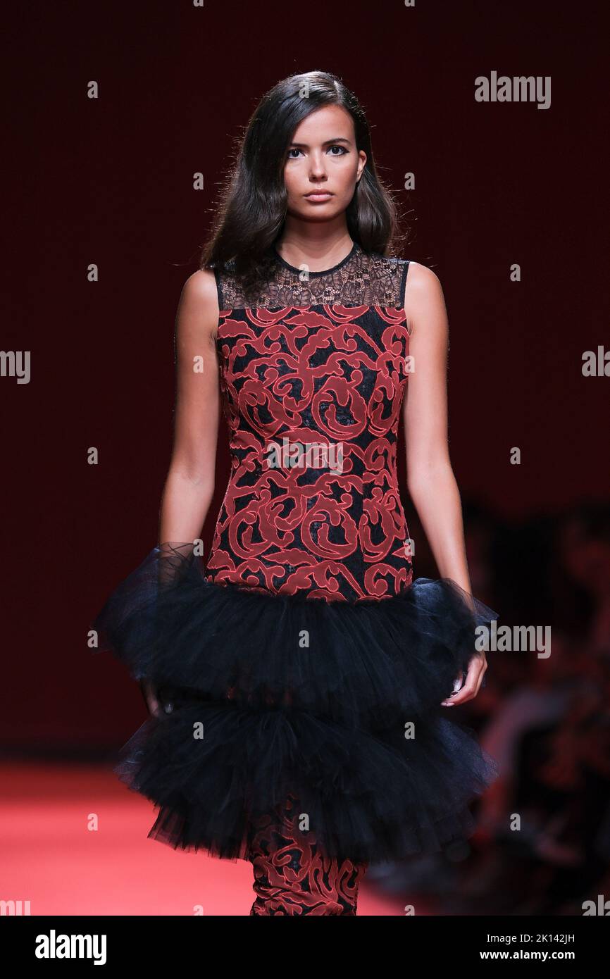 Madrid, Spain. 15th Sep, 2022. A model walks the runway wearing a ...