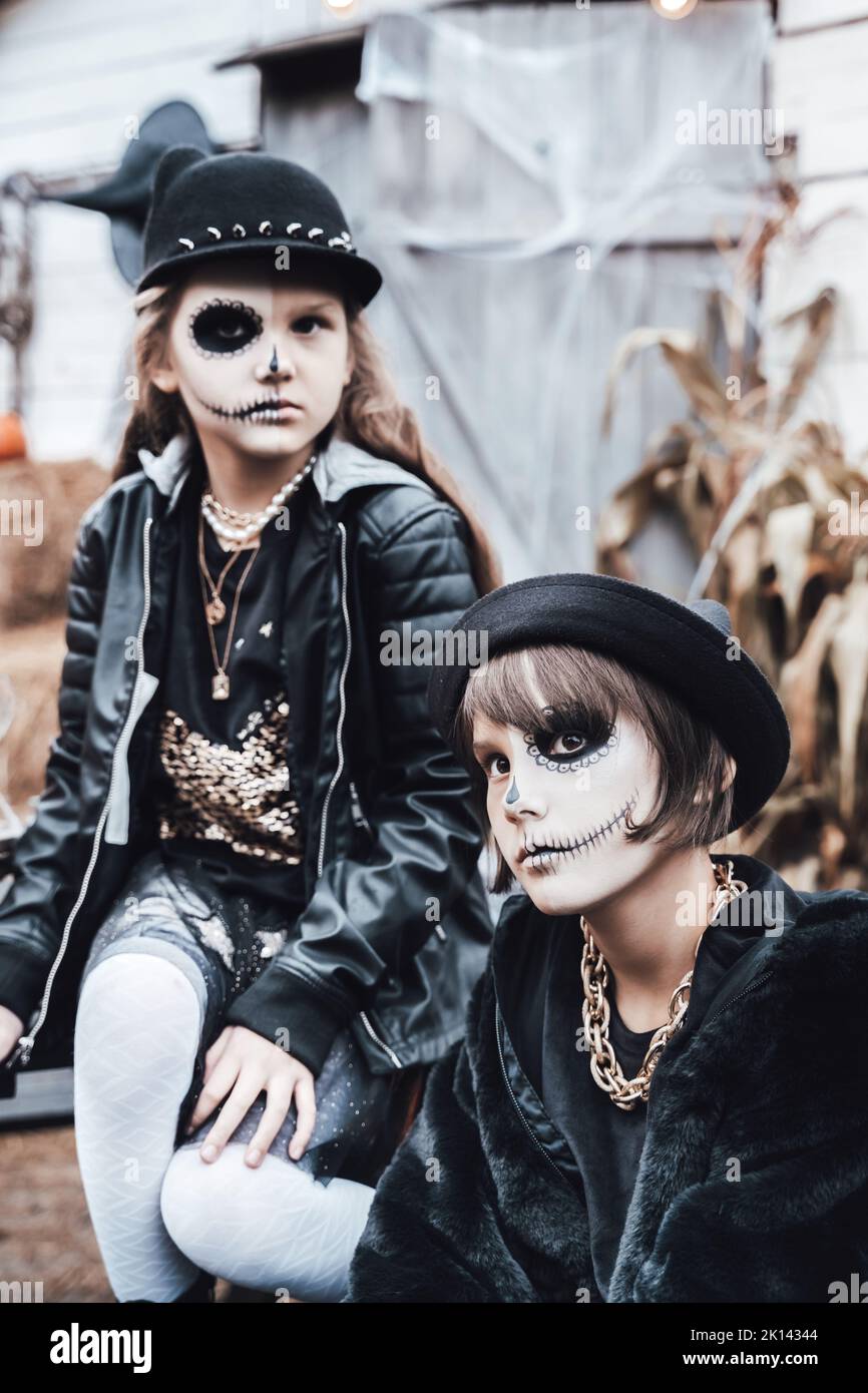 Beautiful scary little girl celebrating halloween. Terrifying black ...