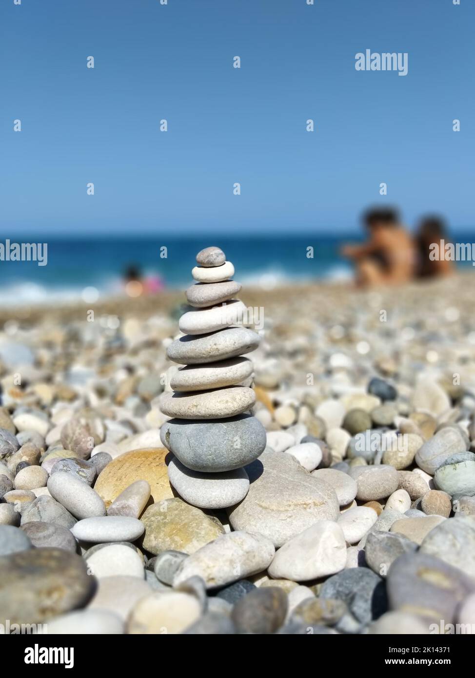 Pebbles stacked on grey hi-res stock photography and images - Alamy