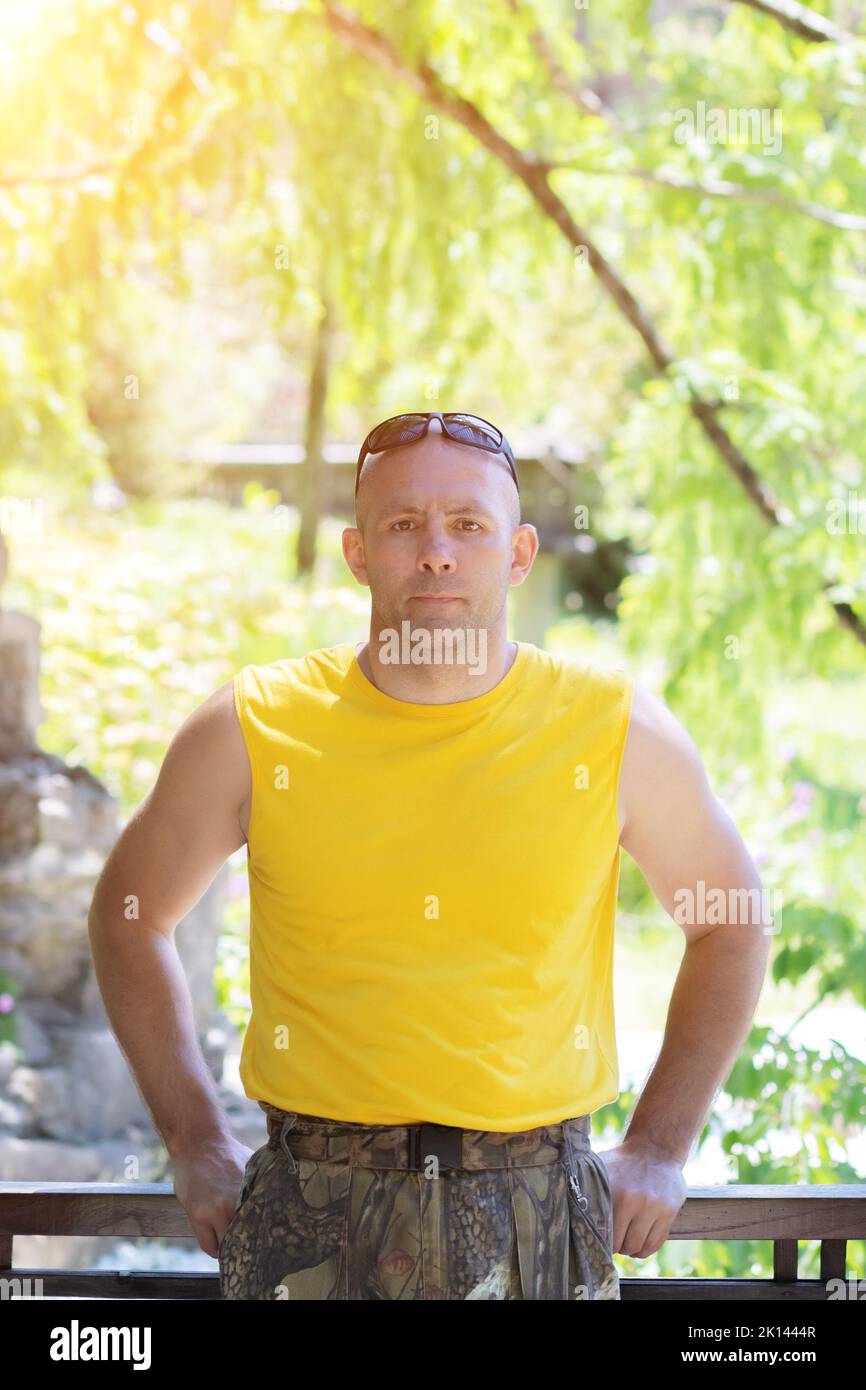 Handsome bald man sunglasses standing hi-res stock photography and ...