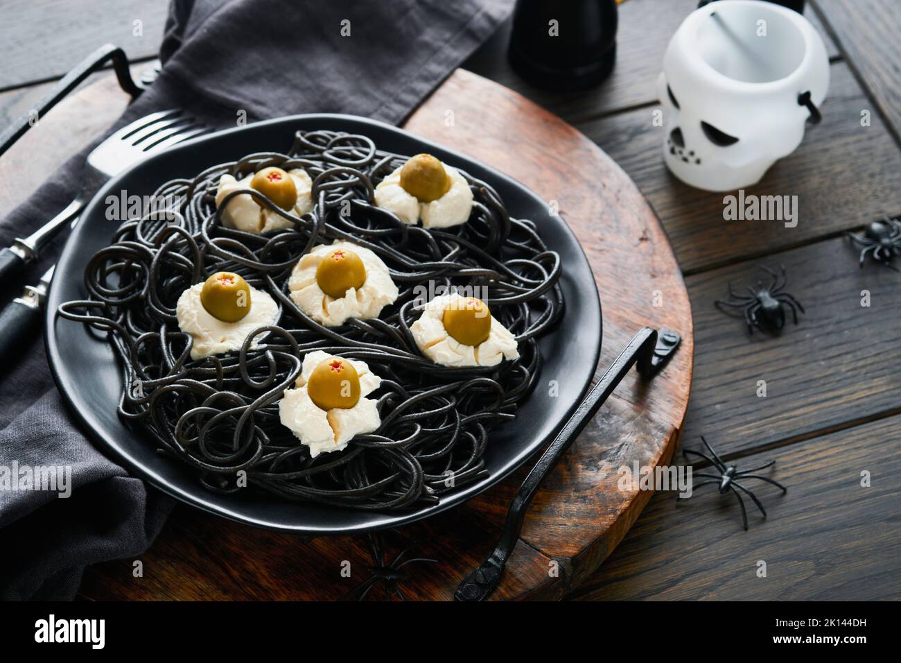 Halloween party Italian black pasta decorated horror olives like eyes ...