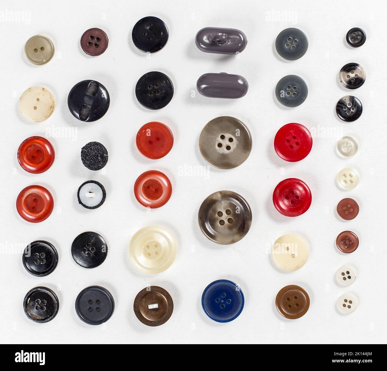 Collection of various sewing button on white background Stock Photo - Alamy